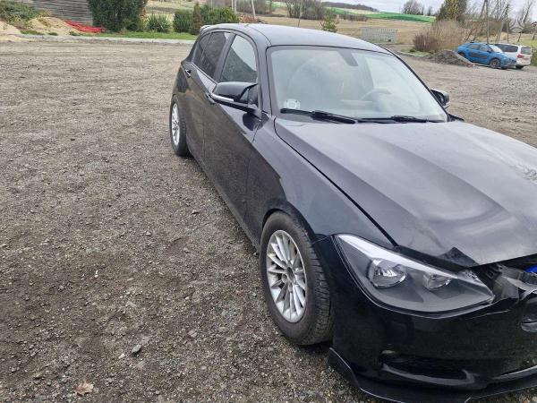 Black BMW 116 2012 in Marijampole, with an engine capacity of 2.00 L and mileage of 350 thousand km for 2800 €, photo 4 on AUTOMOTO.COM.LV