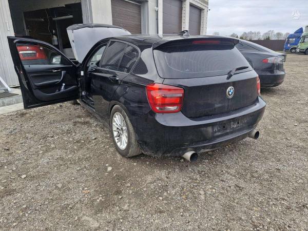 Black BMW 116 2012 in Marijampole, with an engine capacity of 2.00 L and mileage of 350 thousand km for 2800 €, photo 5 on AUTOMOTO.COM.LV