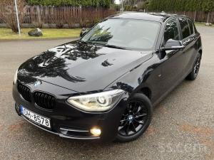 Black BMW 116 2012 in Riga, with an engine capacity of 1.60 L and mileage of 199 thousand km for 6950 €, photo  on AUTOMOTO.COM.LV