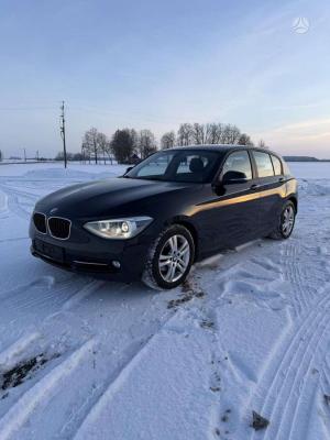 Black BMW 116 2012 in Pasvalys, with an engine capacity of 2.00 L and mileage of 108 thousand km for 7450 €, photo 2 on AUTOMOTO.COM.LV
