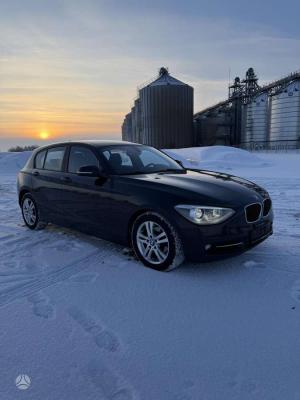 Black BMW 116 2012 in Pasvalys, with an engine capacity of 2.00 L and mileage of 108 thousand km for 7450 €, photo 8 on AUTOMOTO.COM.LV
