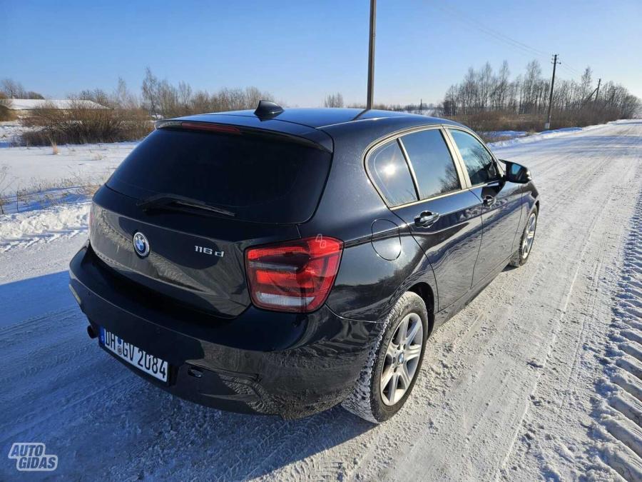 Black BMW 116 2012 in Sakiai, with an engine capacity of 2.00 L and mileage of 211 thousand km for 5200 €, photo 5 on AUTOMOTO.COM.LV