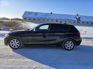 Black BMW 116 2012 in Sakiai, with an engine capacity of 2.00 L and mileage of 211 thousand km for 5200 €, photo 8 on AUTOMOTO.COM.LV