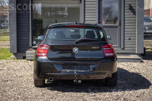 Black BMW 116 2012 in Liepaja, with an engine capacity of 1.60 L and mileage of 306 thousand km for 5900 €, photo 5 on AUTOMOTO.COM.LV