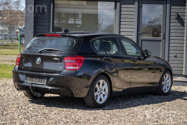Black BMW 116 2012 in Liepaja, with an engine capacity of 1.60 L and mileage of 306 thousand km for 5900 €, photo 6 on AUTOMOTO.COM.LV