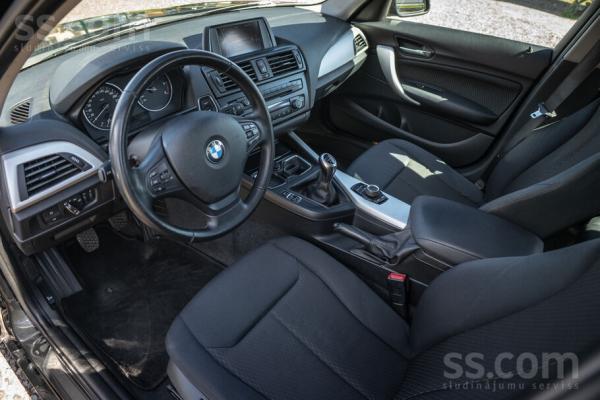 Black BMW 116 2012 in Liepaja, with an engine capacity of 1.60 L and mileage of 306 thousand km for 5900 €, photo 8 on AUTOMOTO.COM.LV