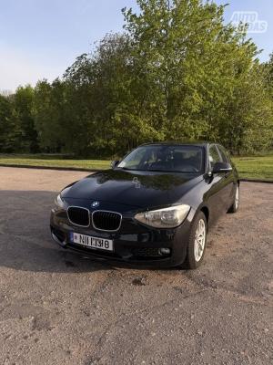 Black BMW 116 2012 in Kaunas, with an engine capacity of 2.00 L and mileage of 308 thousand km for 4900 €, photo  on AUTOMOTO.COM.LV