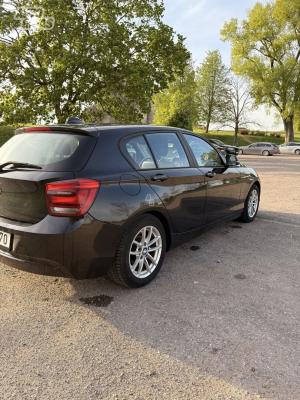 Black BMW 116 2012 in Kaunas, with an engine capacity of 2.00 L and mileage of 308 thousand km for 4900 €, photo 5 on AUTOMOTO.COM.LV