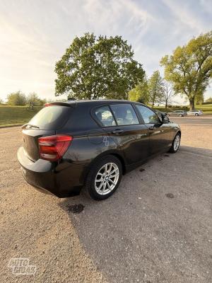 Black BMW 116 2012 in Kaunas, with an engine capacity of 2.00 L and mileage of 308 thousand km for 4900 €, photo 6 on AUTOMOTO.COM.LV