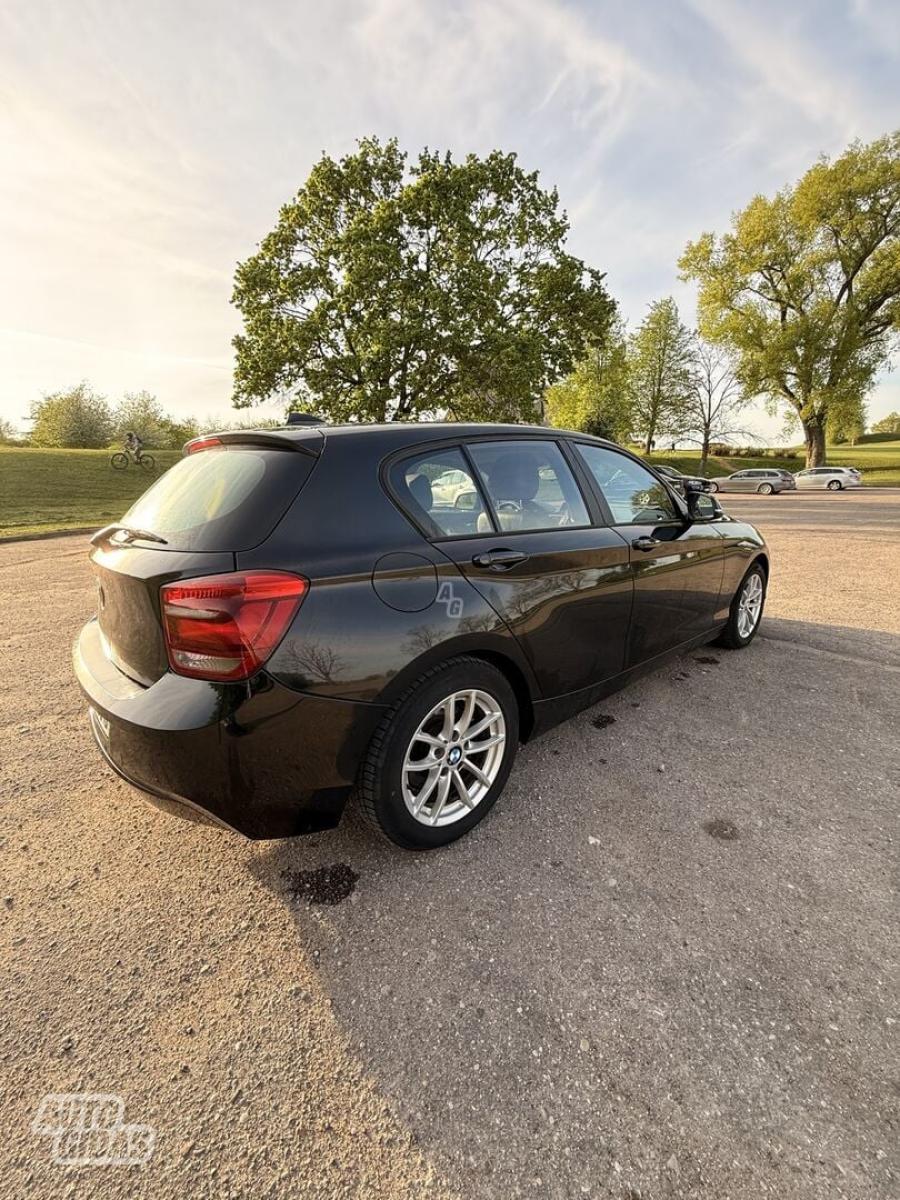 Black BMW 116 2012 in Kaunas, with an engine capacity of 2.00 L and mileage of 308 thousand km for 4900 €, photo 6 on AUTOMOTO.COM.LV