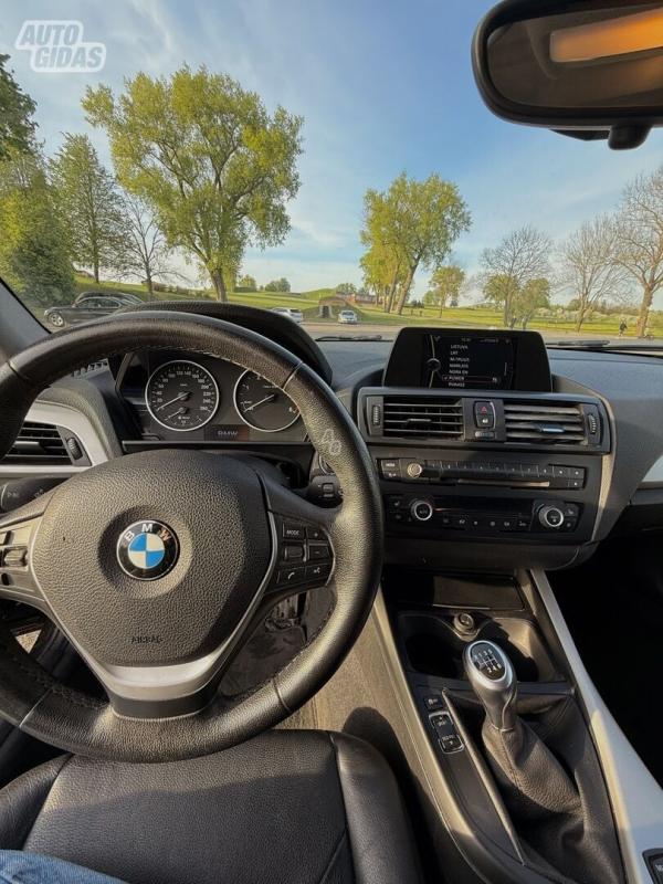 Black BMW 116 2012 in Kaunas, with an engine capacity of 2.00 L and mileage of 308 thousand km for 4900 €, photo 7 on AUTOMOTO.COM.LV