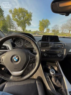 Black BMW 116 2012 in Kaunas, with an engine capacity of 2.00 L and mileage of 308 thousand km for 4900 €, photo 8 on AUTOMOTO.COM.LV