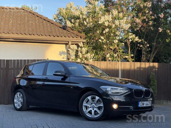 Black BMW 116 2012 in Daugavpils, with an engine capacity of 2.00 L and mileage of 258 thousand km for 8750 €, photo 3 on AUTOMOTO.COM.LV