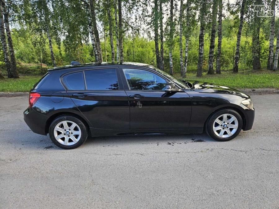 Black BMW 116 2012 in Sakiai, with an engine capacity of 2.00 L and mileage of 211 thousand km for 5200 €, photo 4 on AUTOMOTO.COM.LV