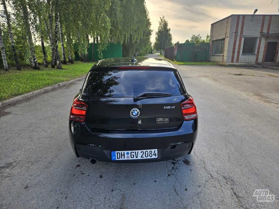 Black BMW 116 2012 in Sakiai, with an engine capacity of 2.00 L and mileage of 211 thousand km for 5200 €, photo 6 on AUTOMOTO.COM.LV