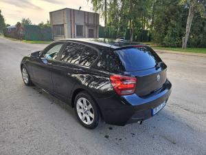 Black BMW 116 2012 in Sakiai, with an engine capacity of 2.00 L and mileage of 211 thousand km for 5200 €, photo 7 on AUTOMOTO.COM.LV