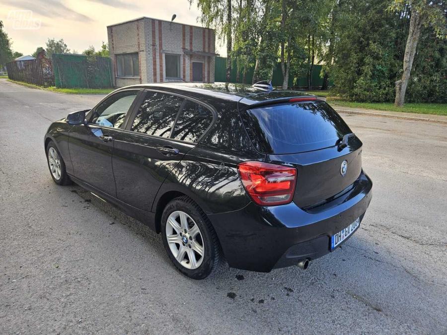 Black BMW 116 2012 in Sakiai, with an engine capacity of 2.00 L and mileage of 211 thousand km for 5200 €, photo 7 on AUTOMOTO.COM.LV