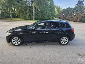 Black BMW 116 2012 in Sakiai, with an engine capacity of 2.00 L and mileage of 211 thousand km for 5200 €, photo 8 on AUTOMOTO.COM.LV