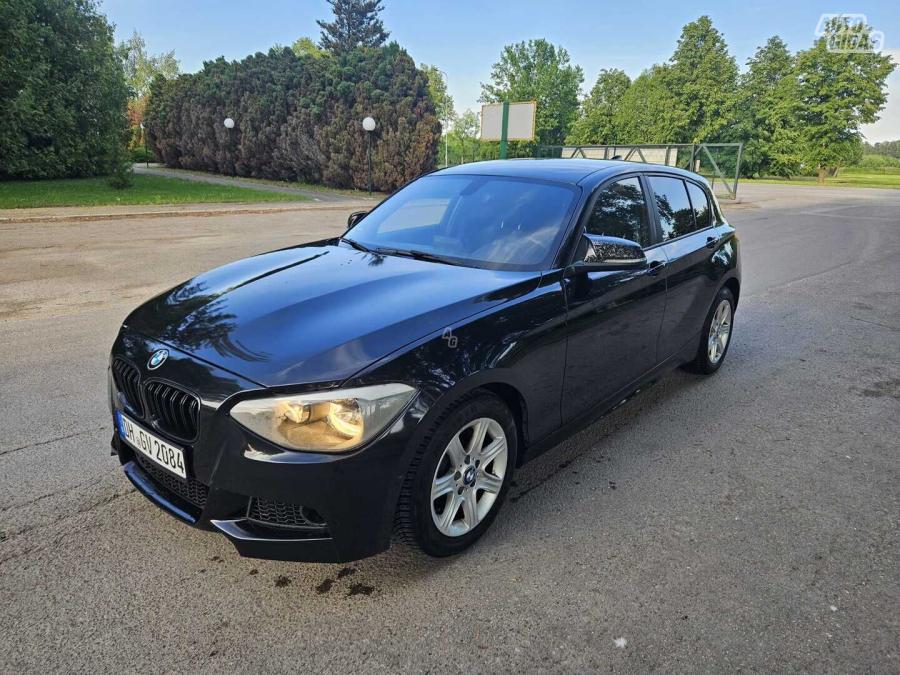 Black BMW 116 2012 in Sakiai, with an engine capacity of 2.00 L and mileage of 211 thousand km for 5200 €, photo 9 on AUTOMOTO.COM.LV