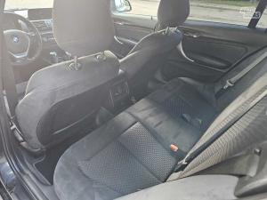 Black BMW 116 2012 in Sakiai, with an engine capacity of 2.00 L and mileage of 211 thousand km for 5200 €, photo 12 on AUTOMOTO.COM.LV