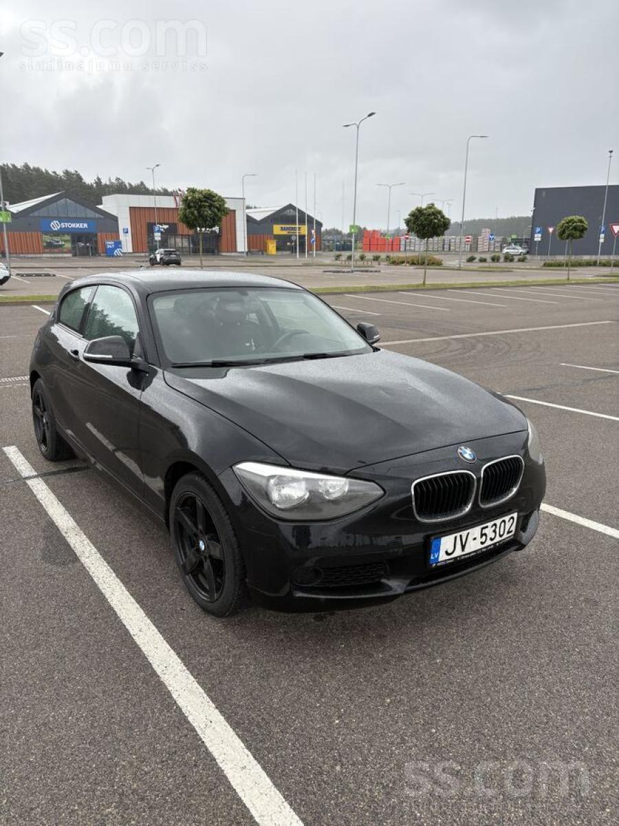 Black BMW 116 2012 in Riga, with an engine capacity of 1.60 L and mileage of 163 thousand km for 4700 €, photo 1 on AUTOMOTO.COM.LV