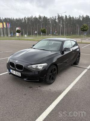 Black BMW 116 2012 in Riga, with an engine capacity of 1.60 L and mileage of 163 thousand km for 4700 €, photo 3 on AUTOMOTO.COM.LV