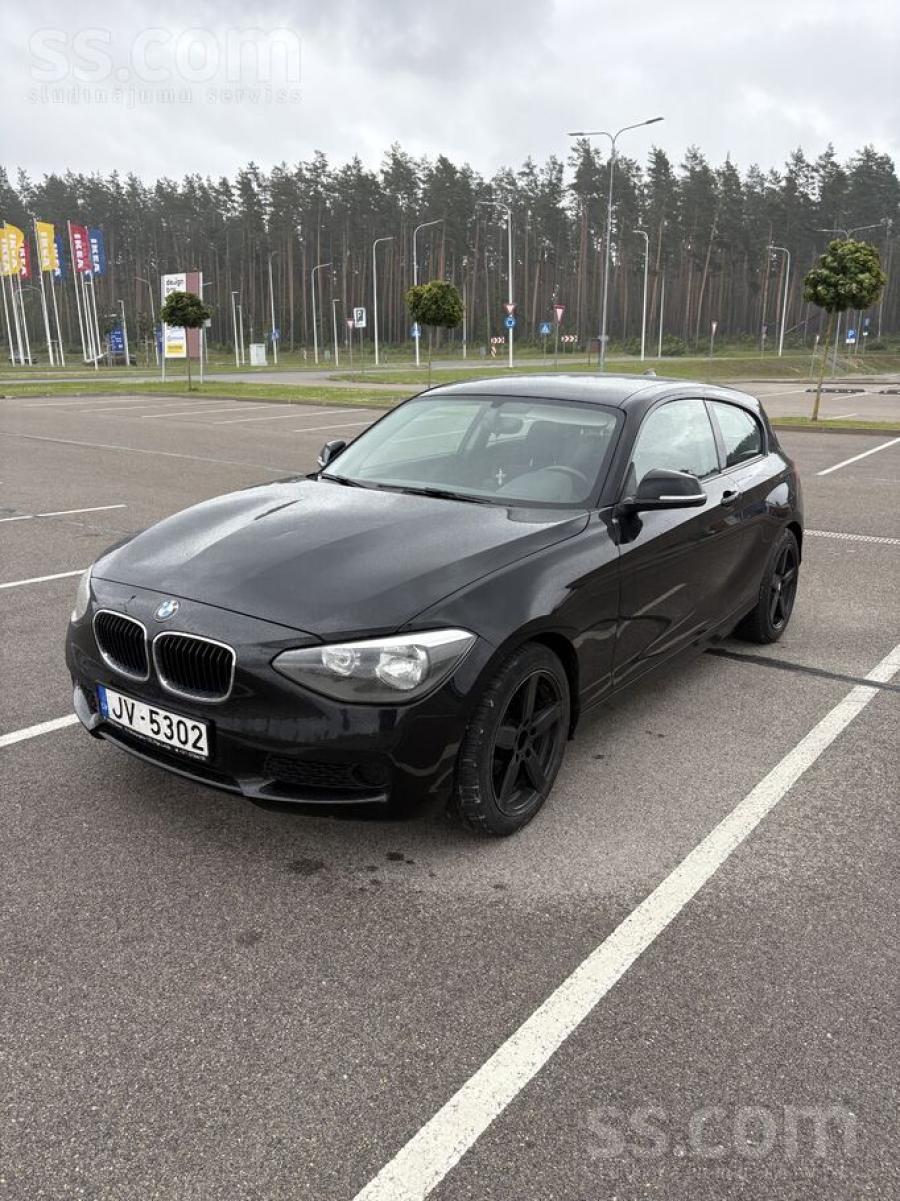 Black BMW 116 2012 in Riga, with an engine capacity of 1.60 L and mileage of 163 thousand km for 4700 €, photo 3 on AUTOMOTO.COM.LV