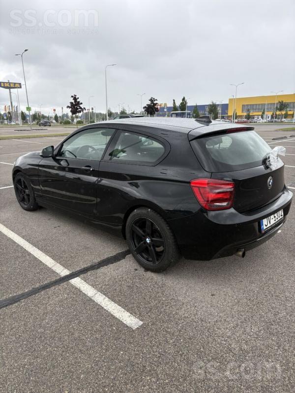 Black BMW 116 2012 in Riga, with an engine capacity of 1.60 L and mileage of 163 thousand km for 4700 €, photo 4 on AUTOMOTO.COM.LV
