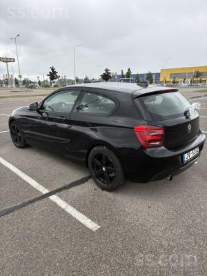 Black BMW 116 2012 in Riga, with an engine capacity of 1.60 L and mileage of 163 thousand km for 4700 €, photo 5 on AUTOMOTO.COM.LV