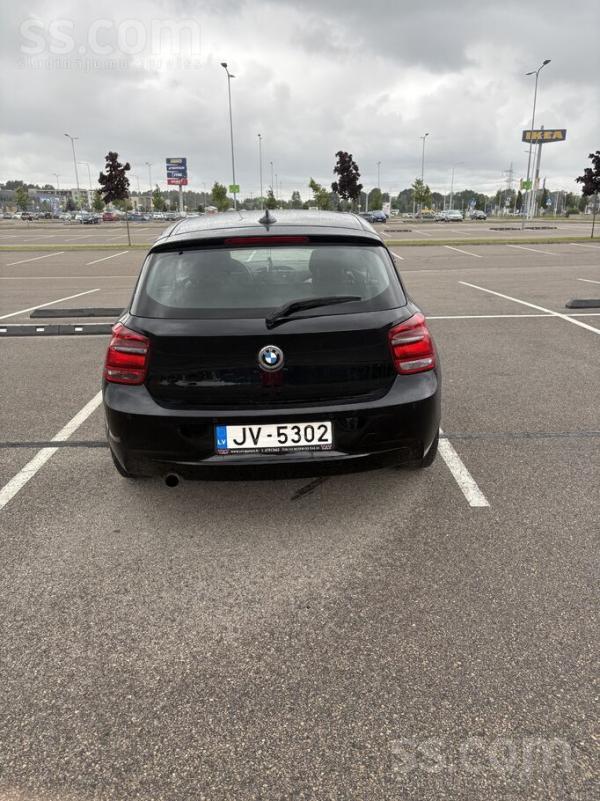 Black BMW 116 2012 in Riga, with an engine capacity of 1.60 L and mileage of 163 thousand km for 4700 €, photo 5 on AUTOMOTO.COM.LV