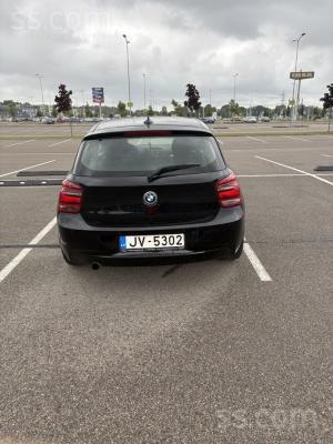 Black BMW 116 2012 in Riga, with an engine capacity of 1.60 L and mileage of 163 thousand km for 4700 €, photo 6 on AUTOMOTO.COM.LV