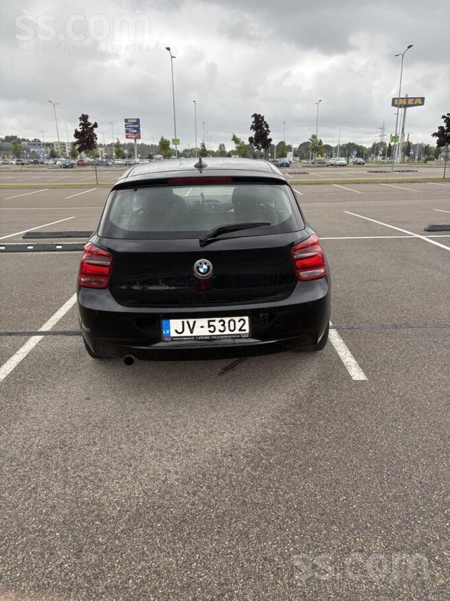 Black BMW 116 2012 in Riga, with an engine capacity of 1.60 L and mileage of 163 thousand km for 4700 €, photo 6 on AUTOMOTO.COM.LV