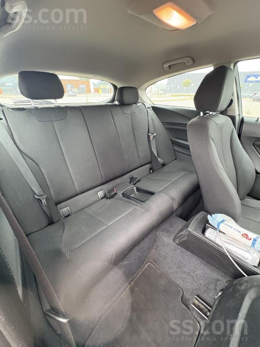 Black BMW 116 2012 in Riga, with an engine capacity of 1.60 L and mileage of 163 thousand km for 4700 €, photo 13 on AUTOMOTO.COM.LV