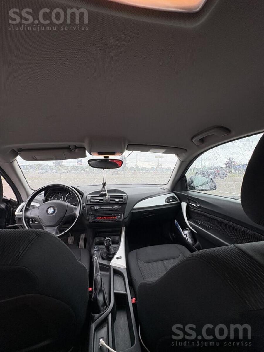 Black BMW 116 2012 in Riga, with an engine capacity of 1.60 L and mileage of 163 thousand km for 4700 €, photo 14 on AUTOMOTO.COM.LV
