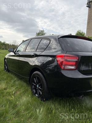 Melns BMW 116 2012 Rīga, ar dzinēja tilpumu 1.60 L un nobraukumu 200 tūkst. km par 6800 €, foto 11 vietnē AUTOMOTO.COM.LV