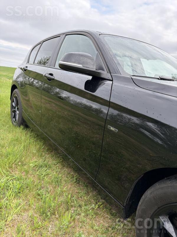 Black BMW 116 2012 in Riga, with an engine capacity of 1.60 L and mileage of 200 thousand km for 5999 €, photo 6 on AUTOMOTO.COM.LV