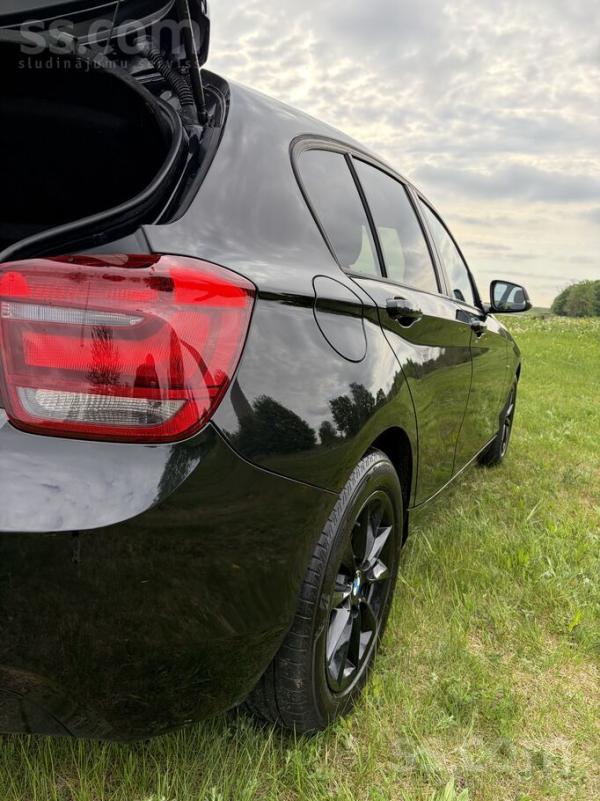 Black BMW 116 2012 in Riga, with an engine capacity of 1.60 L and mileage of 200 thousand km for 5999 €, photo 9 on AUTOMOTO.COM.LV