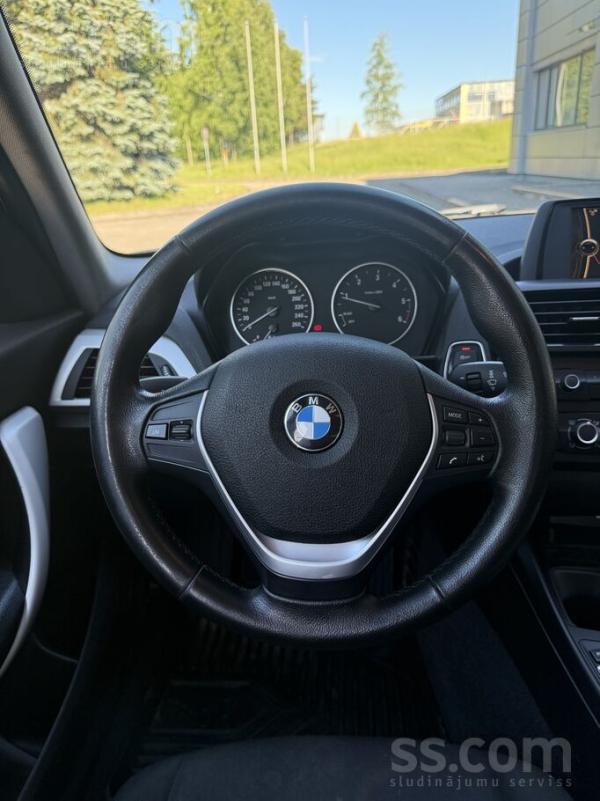 Black BMW 116 2012 in Riga, with an engine capacity of 1.60 L and mileage of 285 thousand km for 6099 €, photo 8 on AUTOMOTO.COM.LV