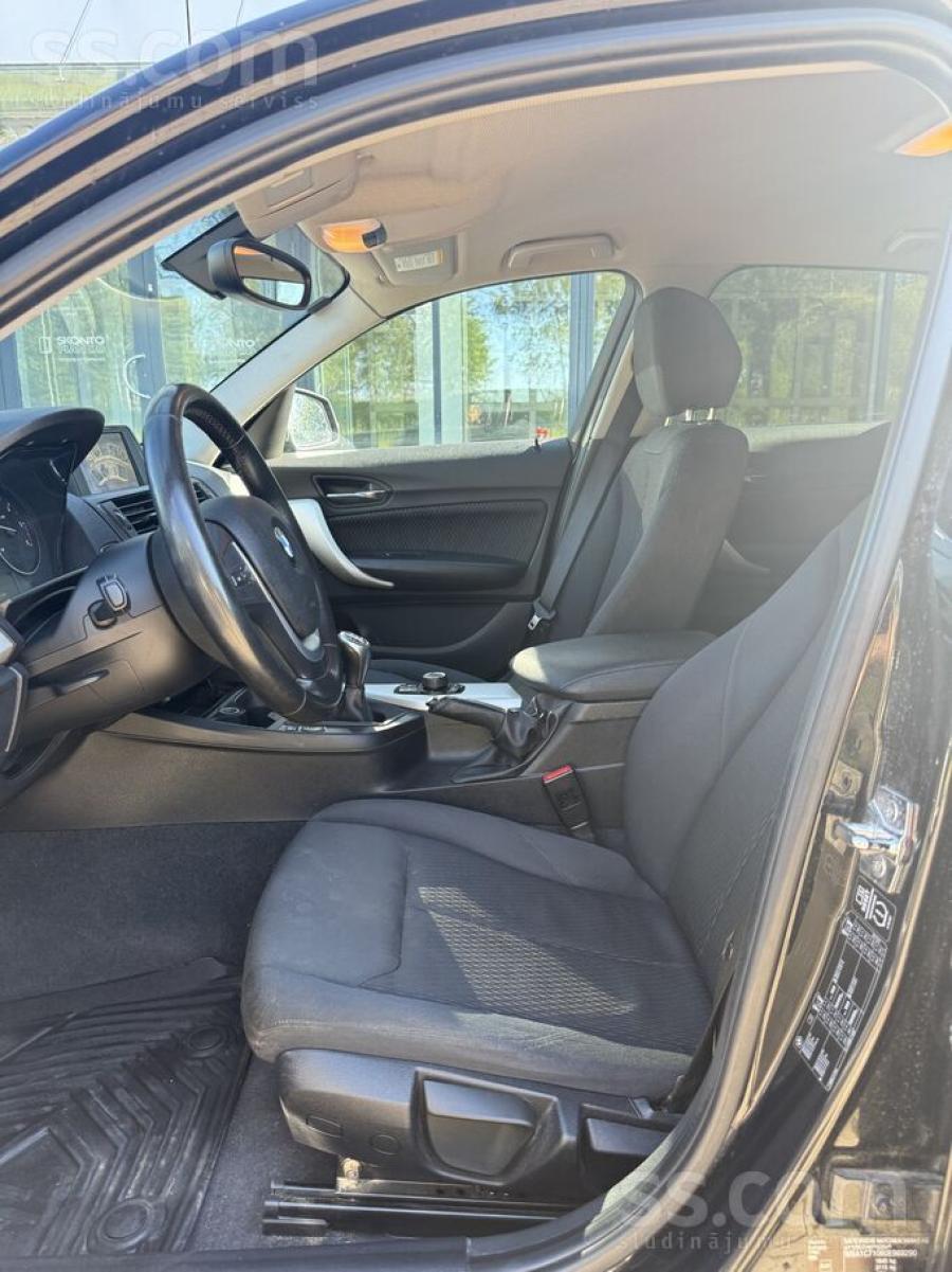 Melns BMW 116 2012 Rīga, ar dzinēja tilpumu 1.60 L un nobraukumu 285 tūkst. km par 6099 €, foto 14 vietnē AUTOMOTO.COM.LV