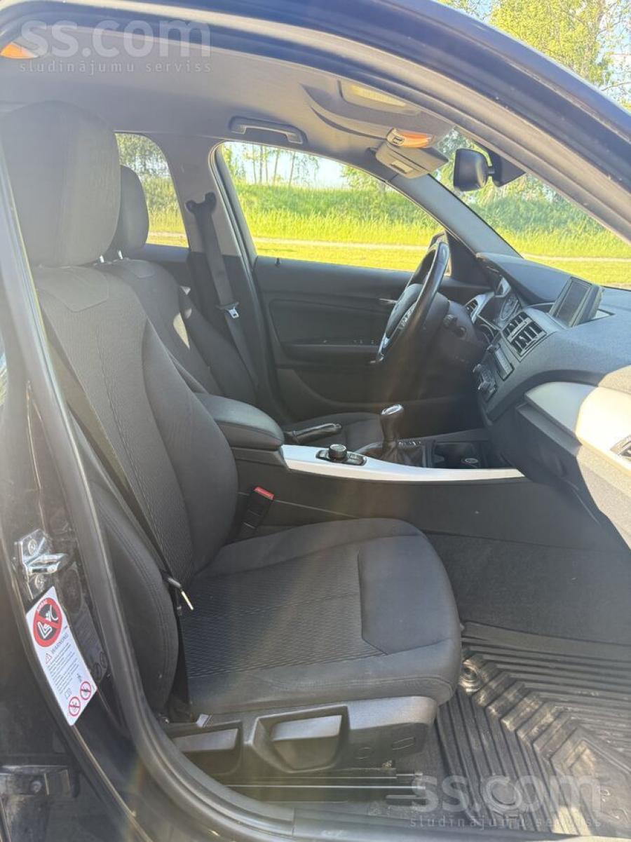Melns BMW 116 2012 Rīga, ar dzinēja tilpumu 1.60 L un nobraukumu 285 tūkst. km par 6099 €, foto 15 vietnē AUTOMOTO.COM.LV
