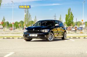 Melns BMW 116 2012 Rīga, ar dzinēja tilpumu 2.00 L un nobraukumu 256 tūkst. km par 6990 €, foto  vietnē AUTOMOTO.COM.LV