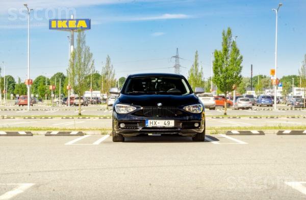 Black BMW 116 2012 in Riga, with an engine capacity of 2.00 L and mileage of 256 thousand km for 6990 €, photo 3 on AUTOMOTO.COM.LV