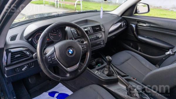 Black BMW 116 2012 in Riga, with an engine capacity of 2.00 L and mileage of 256 thousand km for 6990 €, photo 10 on AUTOMOTO.COM.LV