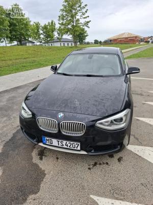 Black BMW 116 2012 in Jonava, with an engine capacity of 2.00 L and mileage of 323 thousand km for 4250 €, photo  on AUTOMOTO.COM.LV