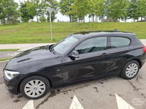 Black BMW 116 2012 in Jonava, with an engine capacity of 2.00 L and mileage of 323 thousand km for 4250 €, photo 4 on AUTOMOTO.COM.LV