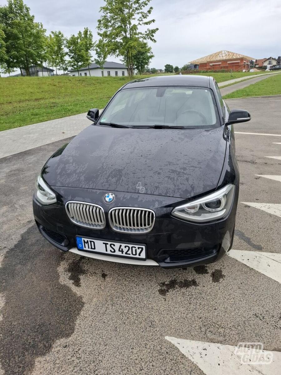 Black BMW 116 2012 in Jonava, with an engine capacity of 2.00 L and mileage of 323 thousand km for 4250 €, photo 5 on AUTOMOTO.COM.LV