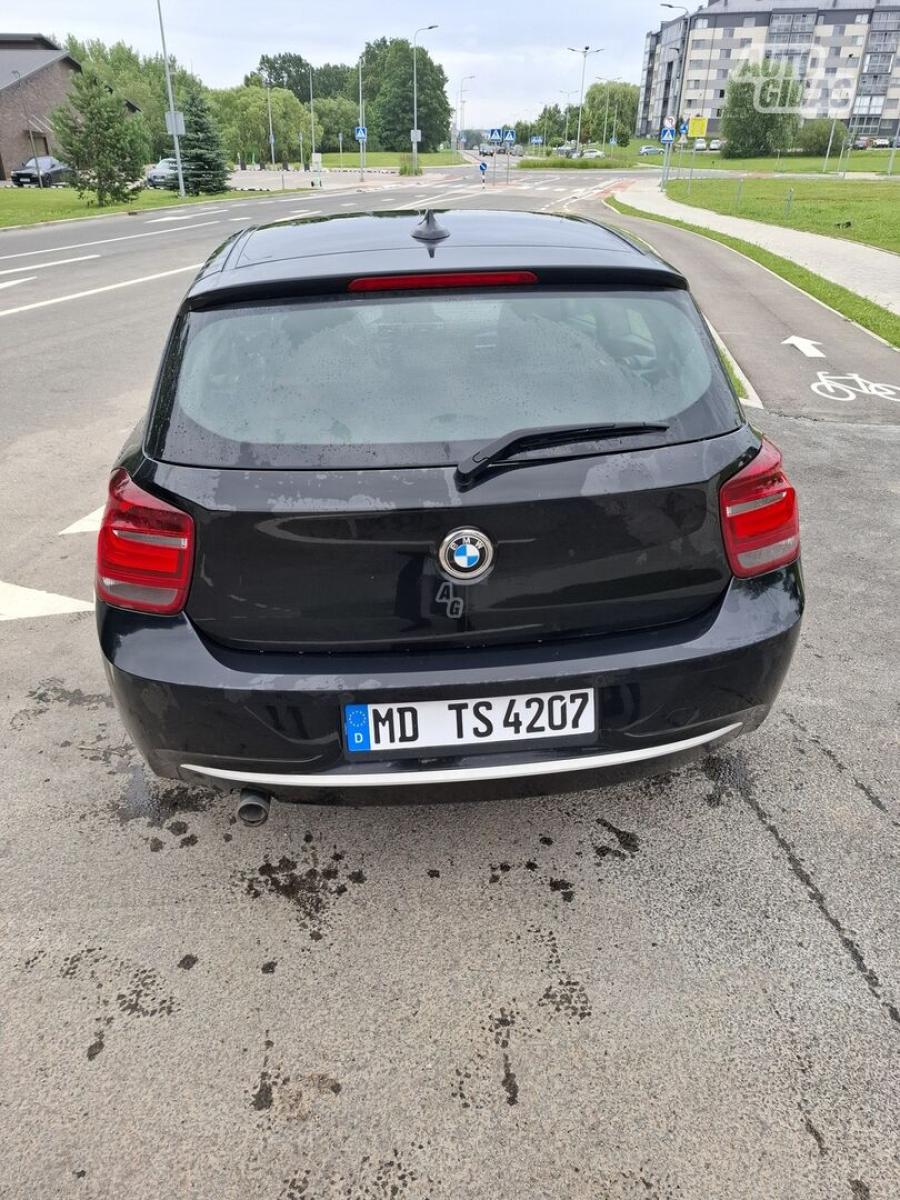 Black BMW 116 2012 in Jonava, with an engine capacity of 2.00 L and mileage of 323 thousand km for 4250 €, photo 7 on AUTOMOTO.COM.LV