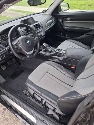Black BMW 116 2012 in Jonava, with an engine capacity of 2.00 L and mileage of 323 thousand km for 4250 €, photo 12 on AUTOMOTO.COM.LV