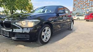 Black BMW 116 2012 in Kaunas, with an engine capacity of 2.00 L and mileage of 211 thousand km for 5200 €, photo 3 on AUTOMOTO.COM.LV