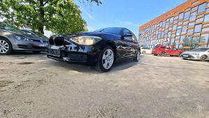 Black BMW 116 2012 in Kaunas, with an engine capacity of 2.00 L and mileage of 211 thousand km for 5200 €, photo 4 on AUTOMOTO.COM.LV